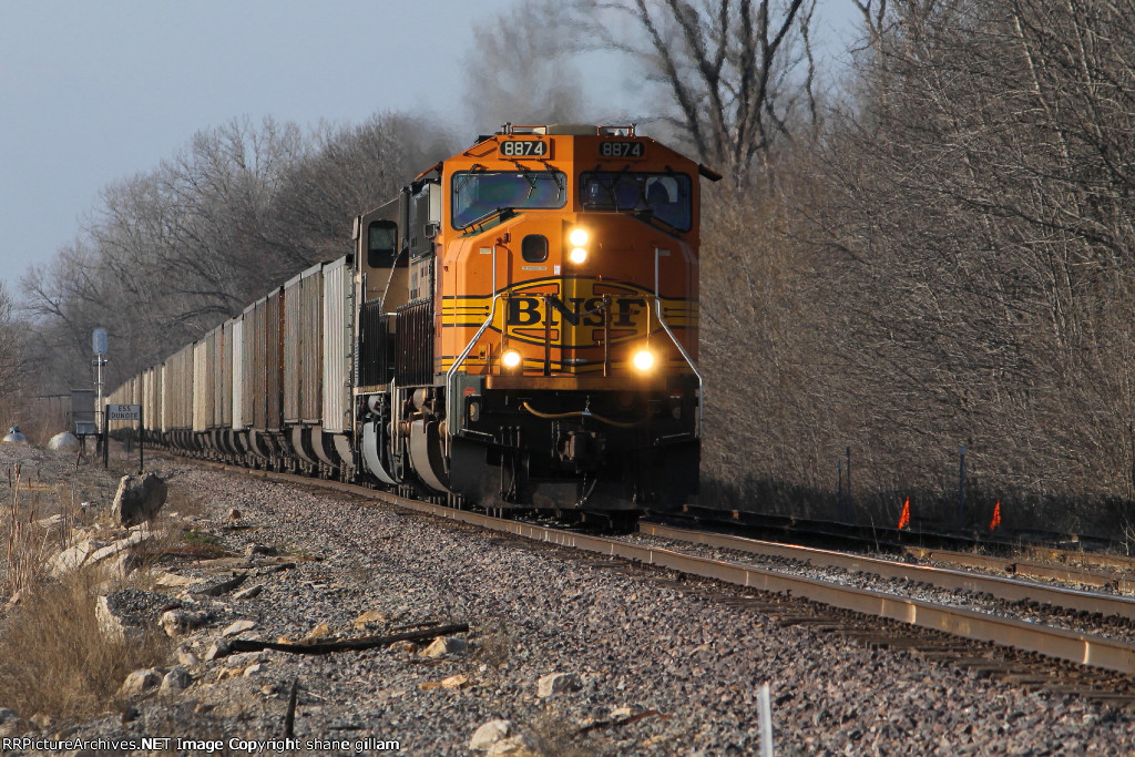 BNSF 8874 leads a slc load of coal sb.